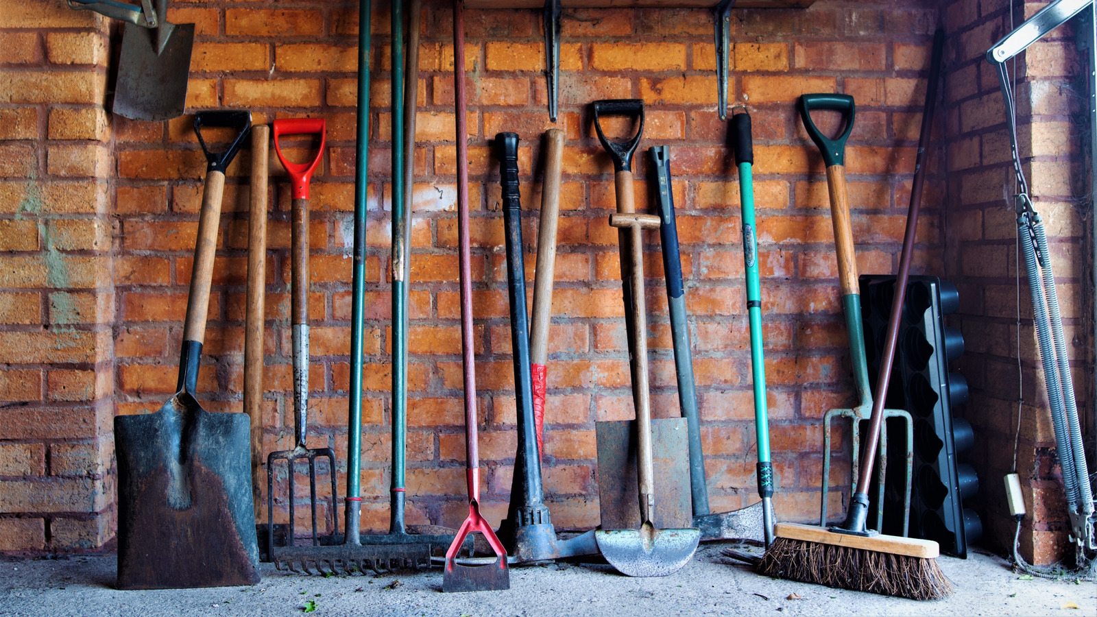 How To Build A Simple Wall-Mounted Yard Tool Organizer On A Budget
