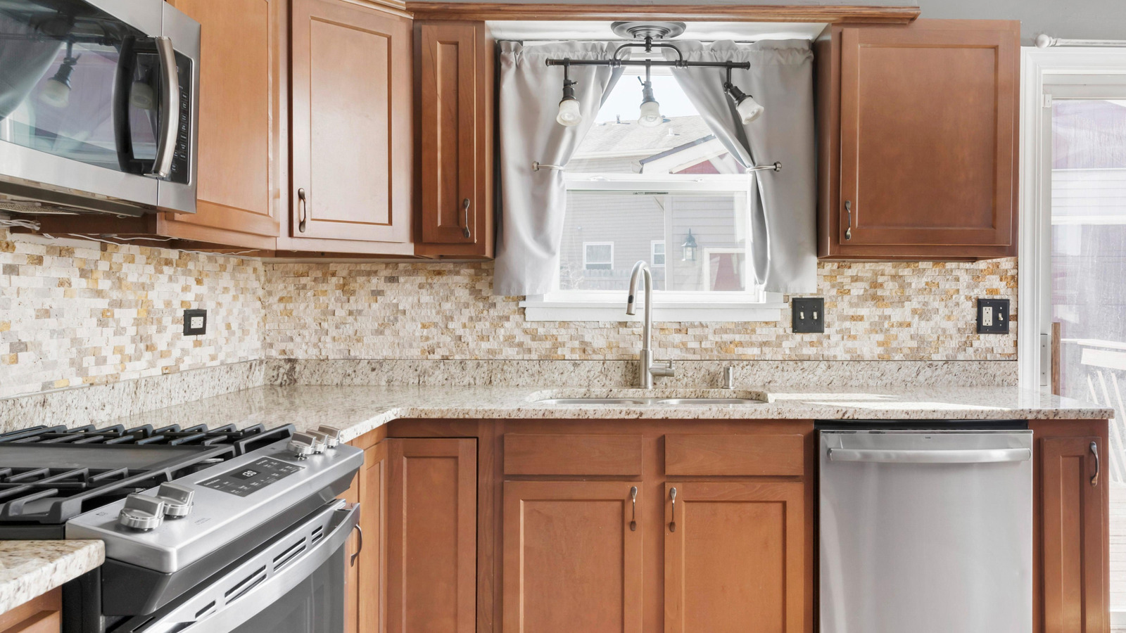 Forget Paint: There's An Easier Way To Give Dated Cabinets A Stylish ...