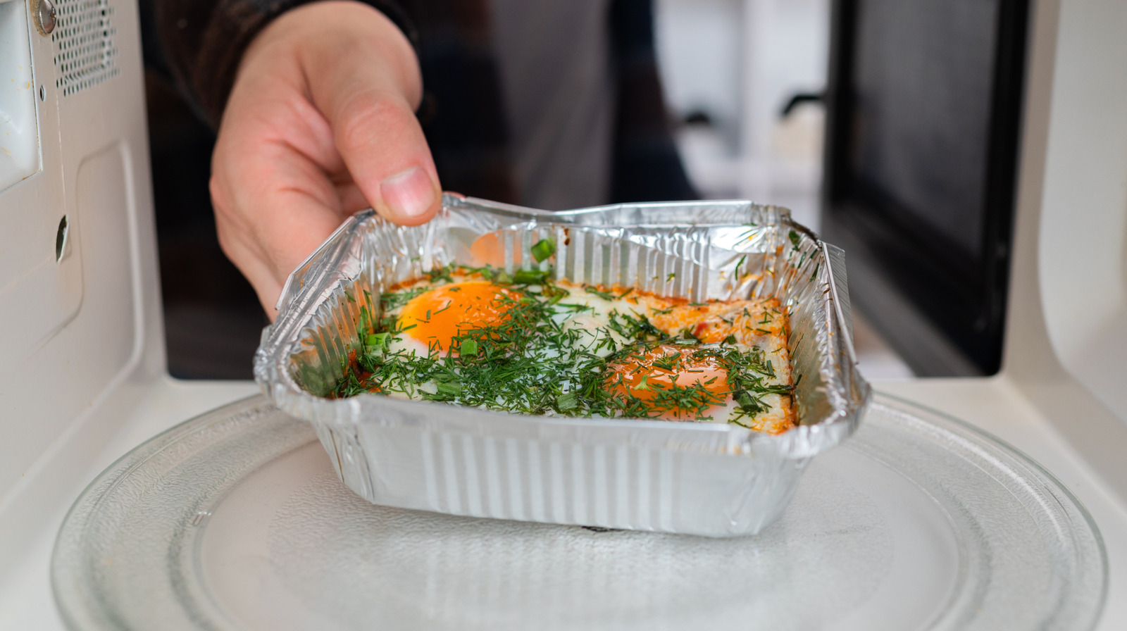 Can You Put Aluminum In Your Microwave? Here's What Happens If You Do