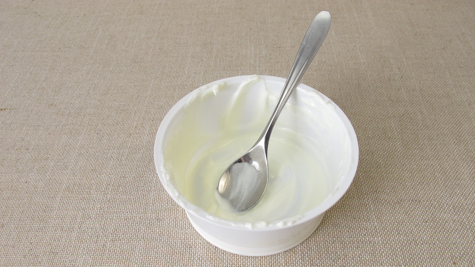 Repurpose Empty Yogurt Containers Into A Unique Kitchen Storage Solution