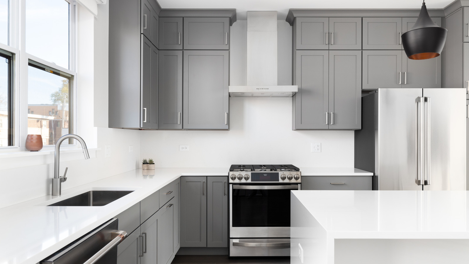 Say Goodbye To Stark Kitchen Cabinets — This Color Trend Will Dominate 2026