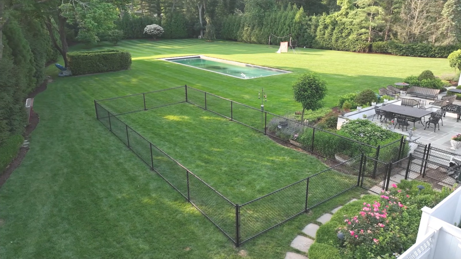 The Affordable Way To Cover A Chain-Link Fence To Make It Way Less Of ...