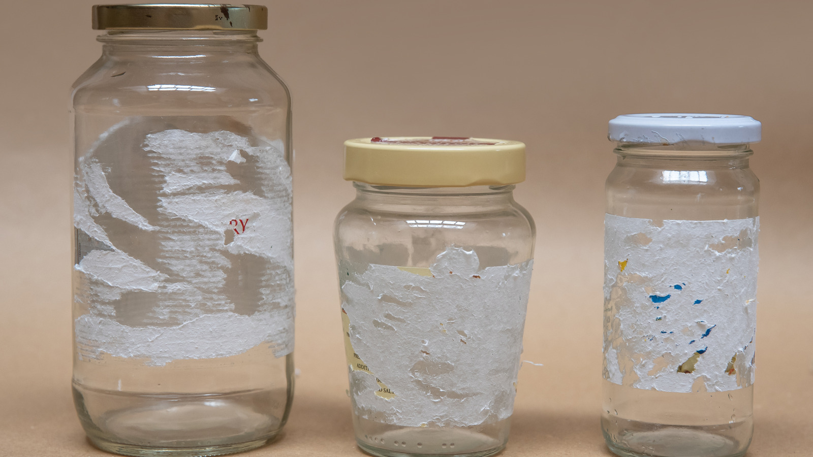 The Simple Trick To Get Pesky Stickers Off Of Glass