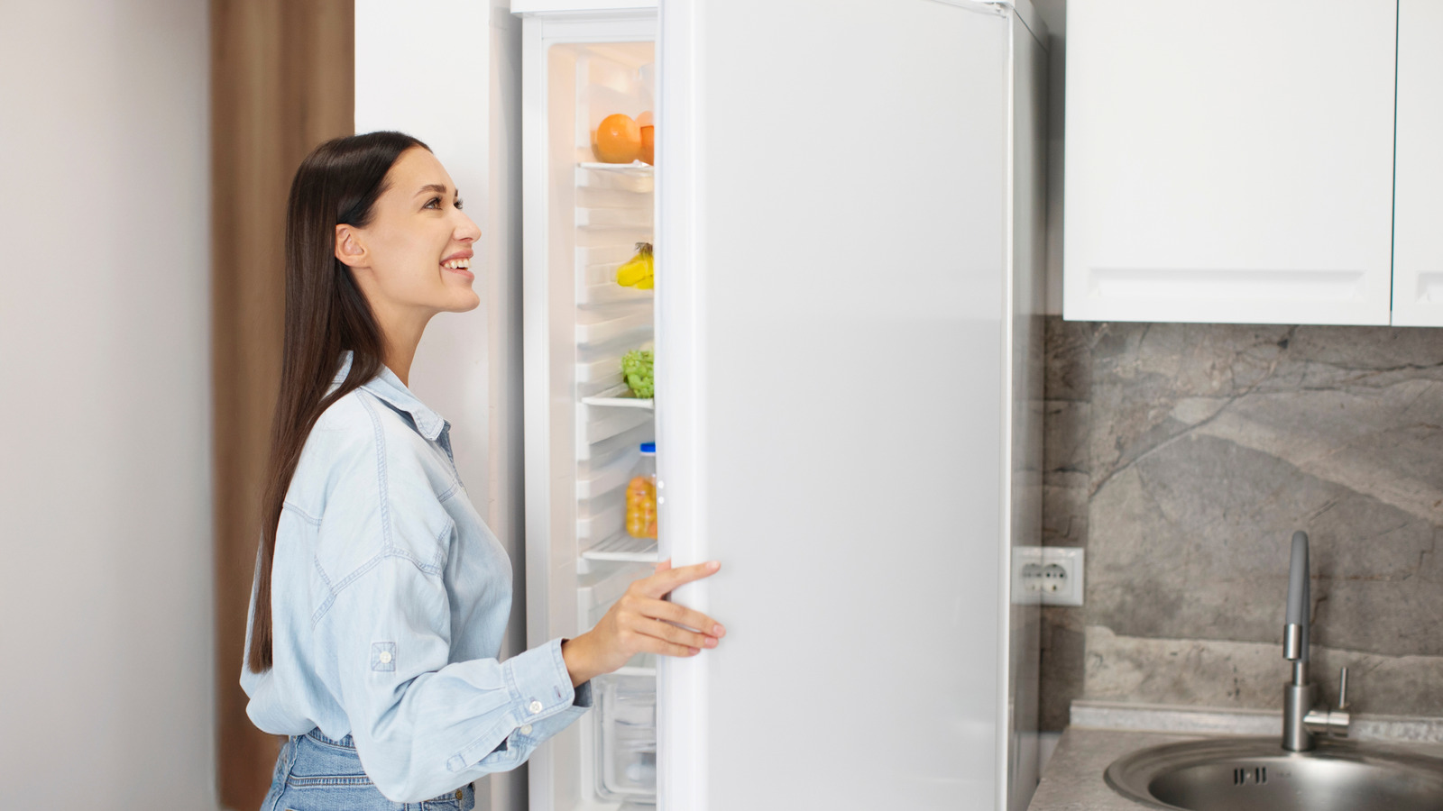 The Smart Way To Use Wax Paper To Keep Your Fridge Clean