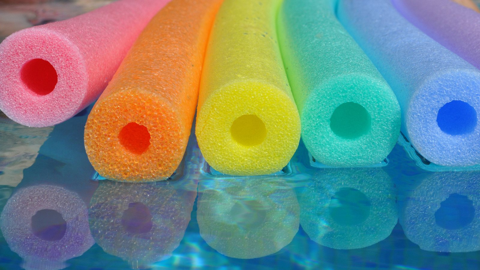 How To Upcycle Pool Noodles Into Cute And Colorful Rainbow Wall Decor