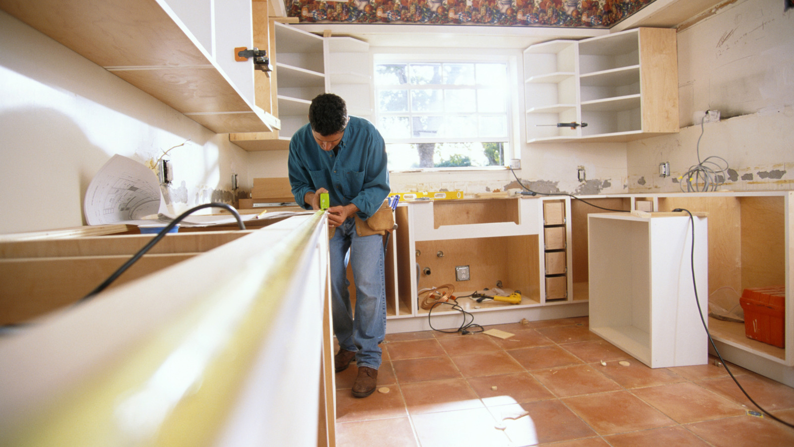What Should You Install First: Tile Floors Or Cabinets?
