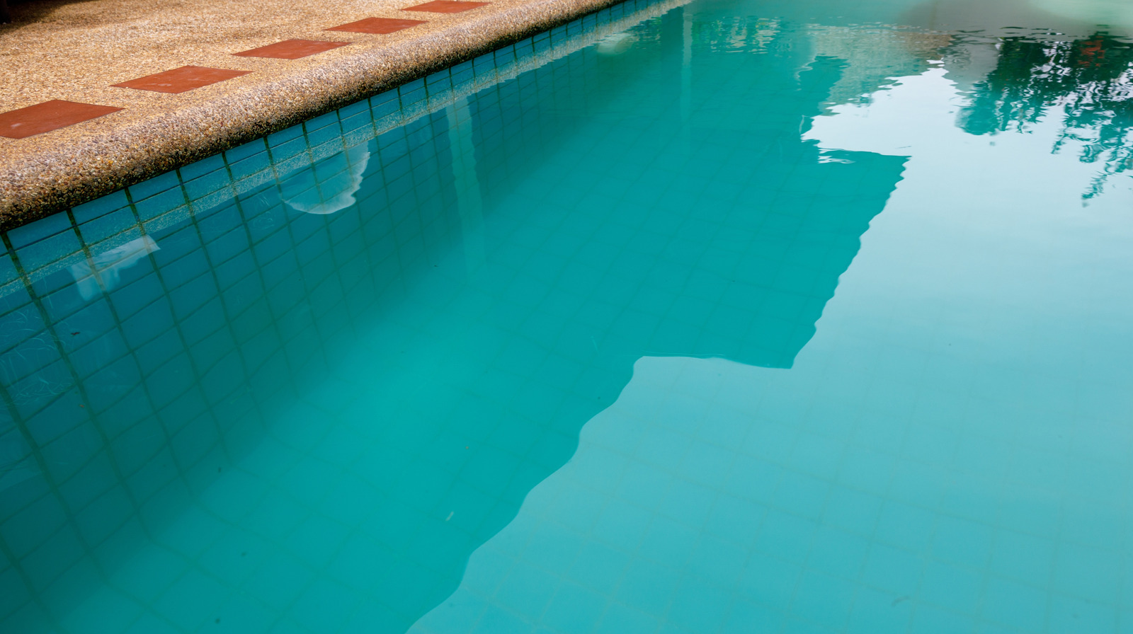 Why Your Pool Water Looks So Cloudy (& The Best Way To Fix It)